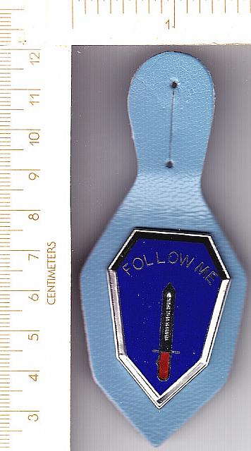 U.S. Army Infantry School Instructor badge holding for M.C.